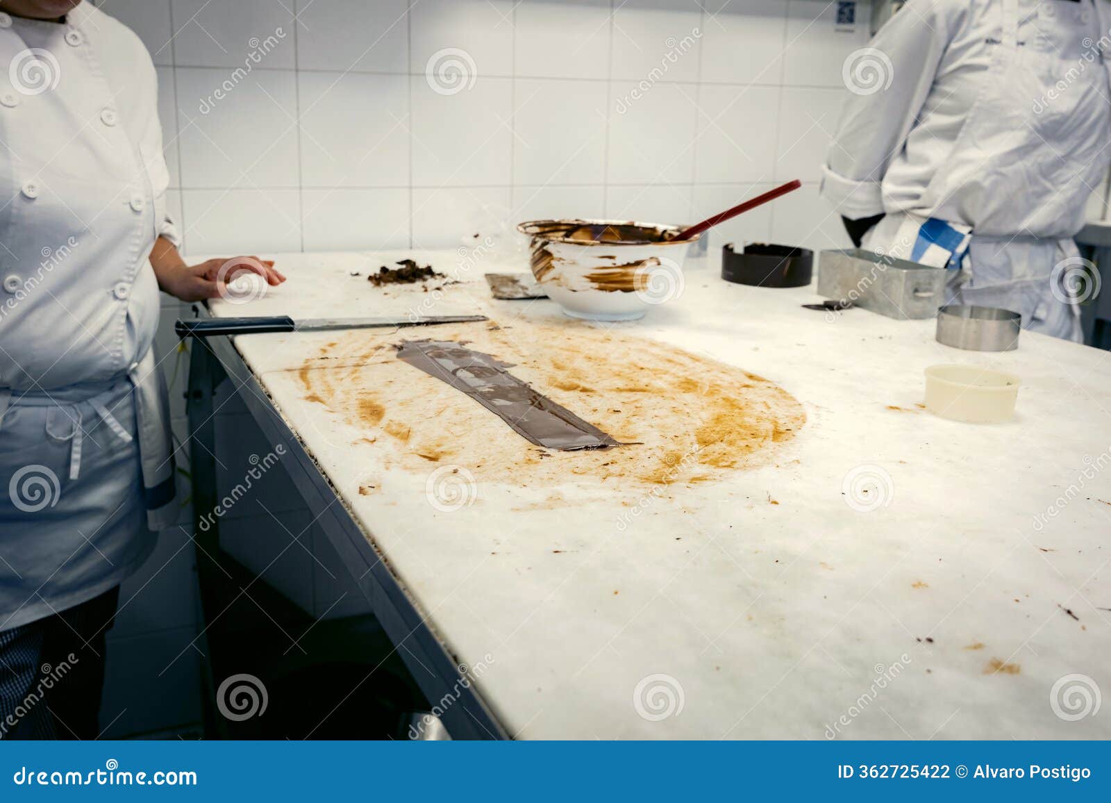 Pastry Chef Tempering Chocolate in a Professional Bakery Stock Photo ...