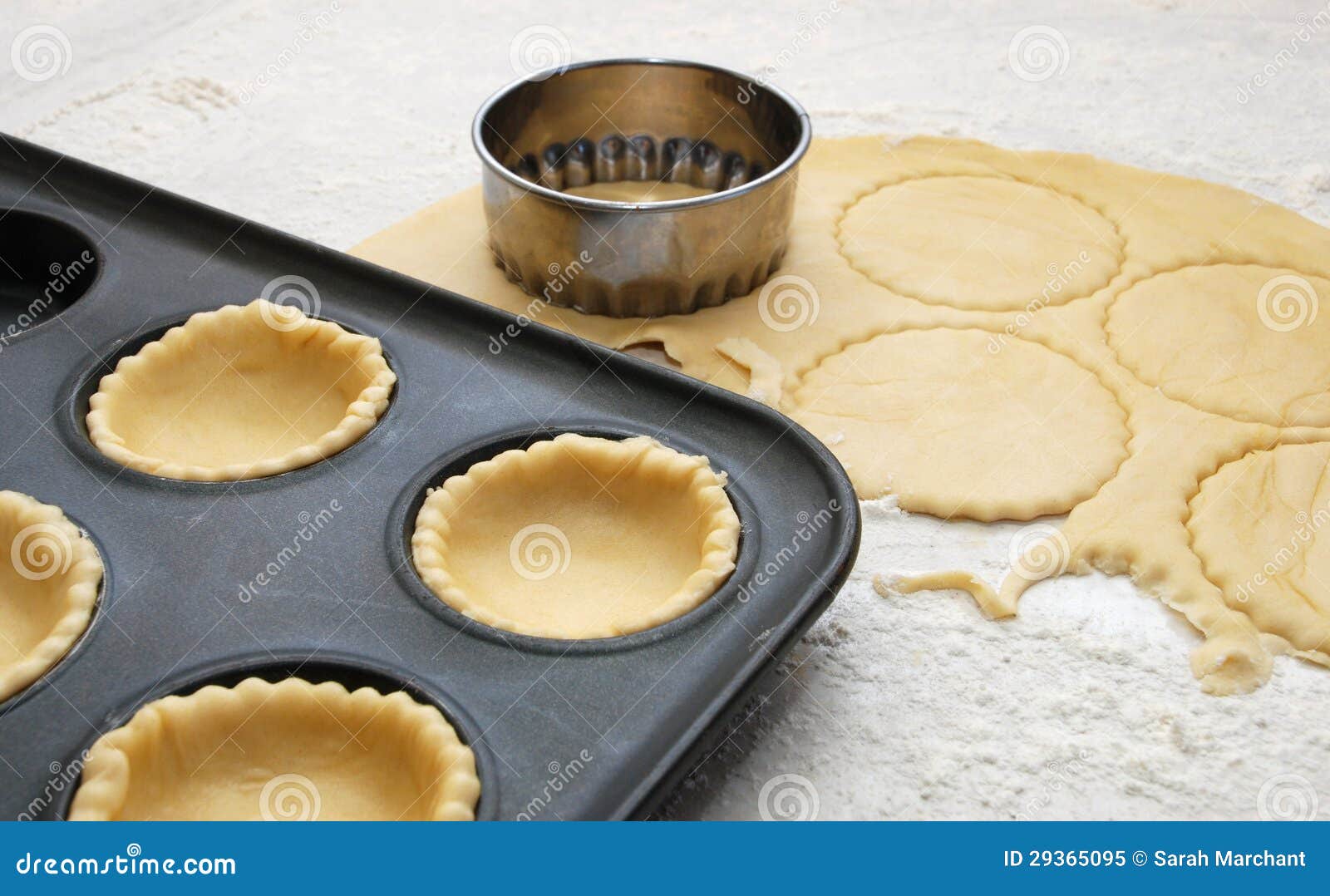 Pastry Circles Cut and Lining a Metal Bun Tin Stock Image - Image of ...