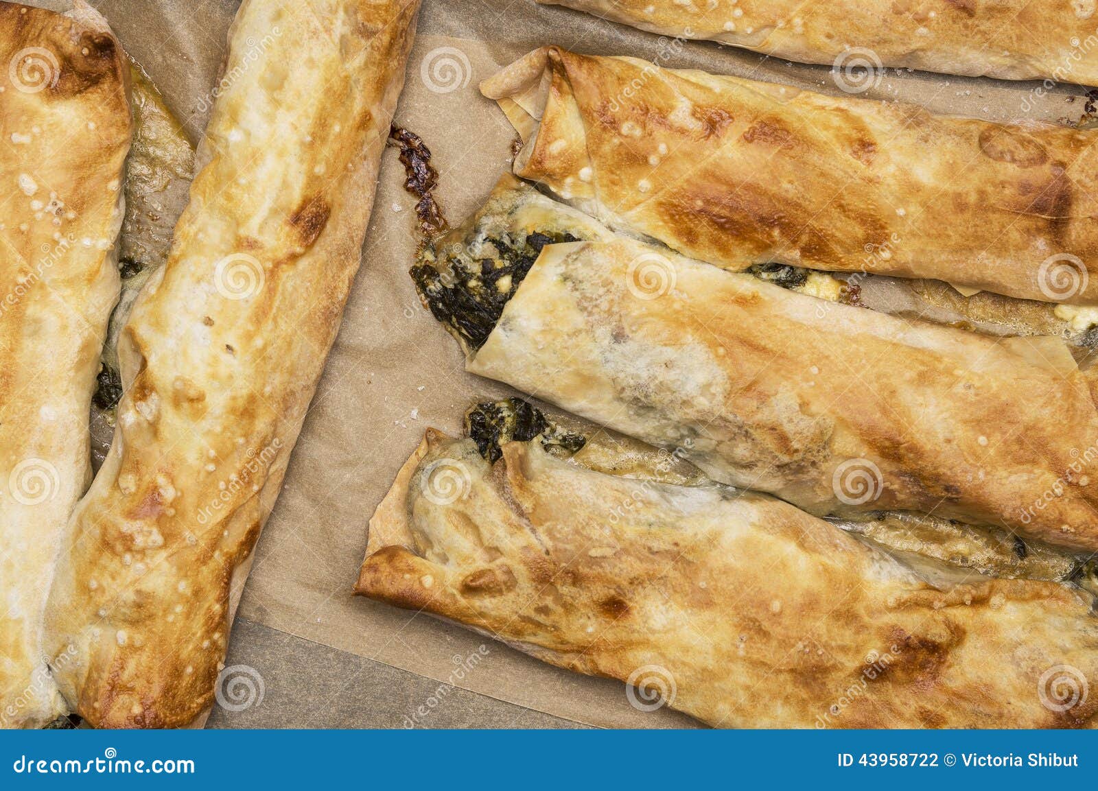 Pastry Pies Roll Baked on Paper Stock Photo - Image of pies, rolls ...