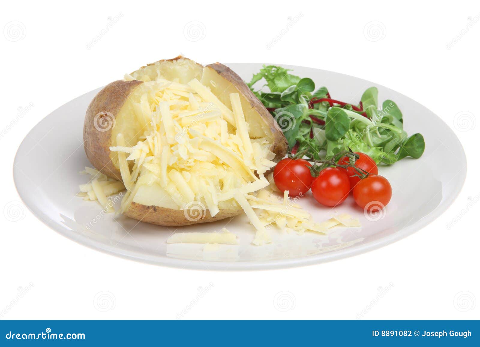 Patata Cocida Al Horno Con Queso De Cheddar Foto de archivo - Imagen de ...