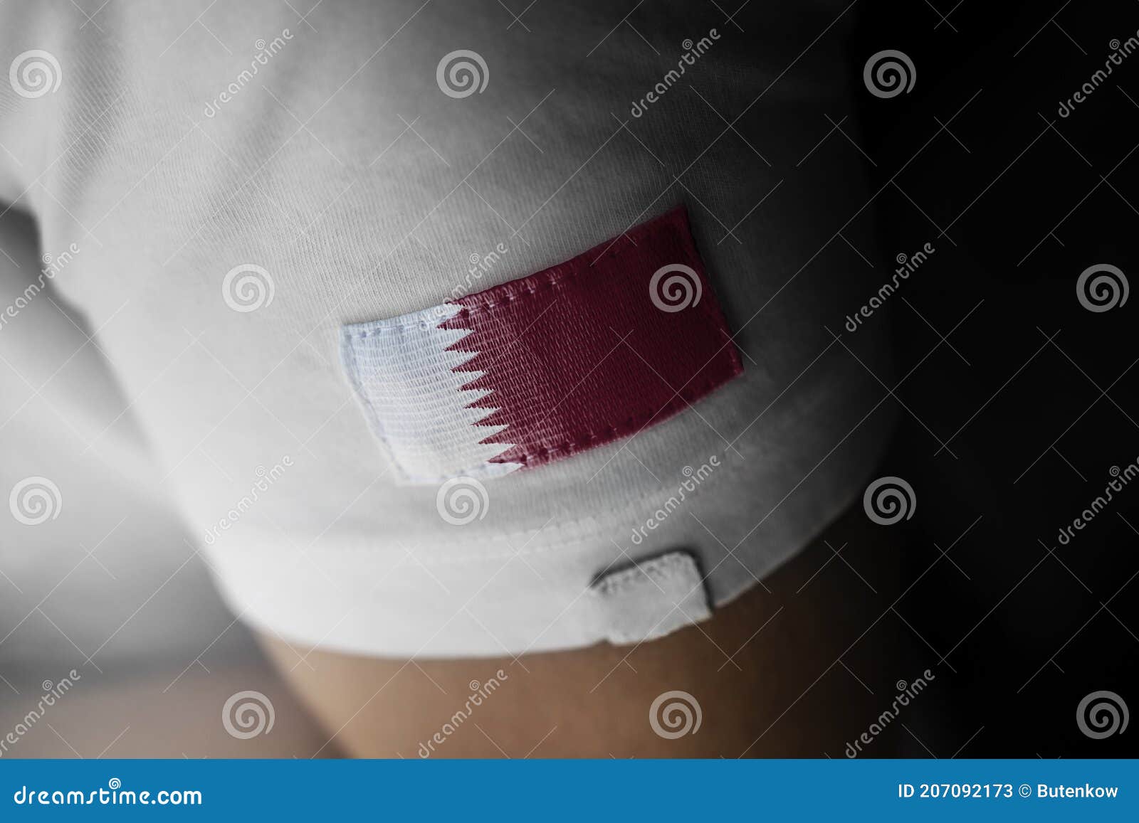 Patch of the National Flag of the Qatar on a White T-shirt Stock Image ...