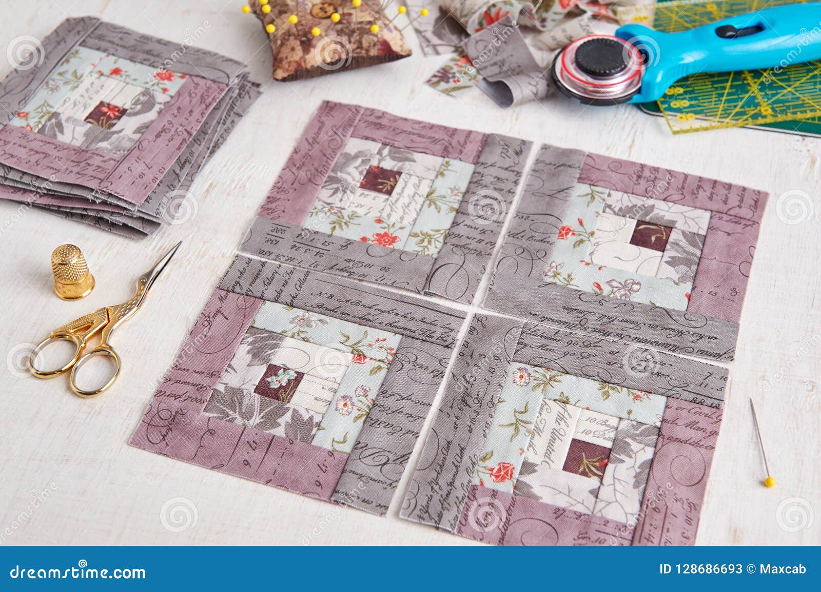 Patchwork Log Cabin Blocks, Stack of Blocks, Sewing Accessories on ...