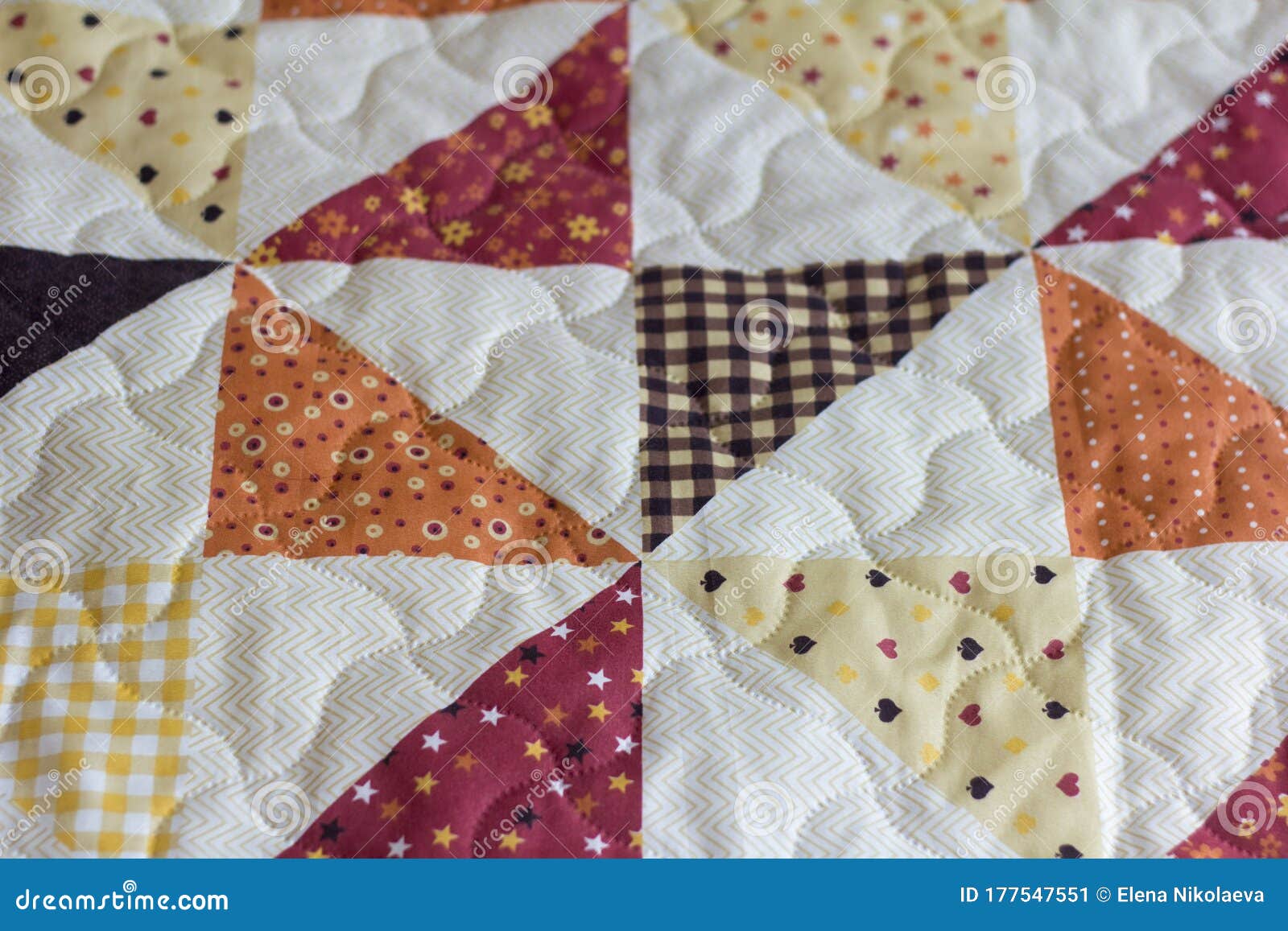 A Patchwork Quilt or Bedspread.a Fragment of a Patchwork Quilt As a ...