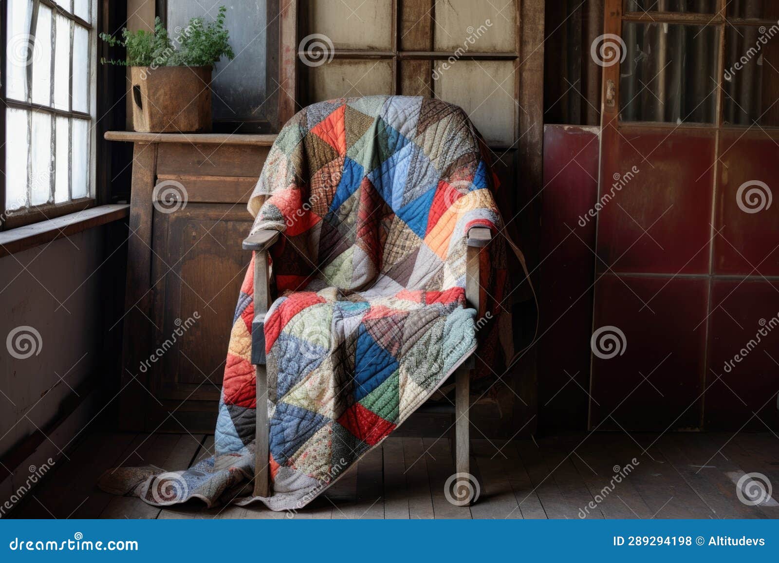 Patchwork Quilt Draped Over a Wooden Chair Stock Photo - Image of ...