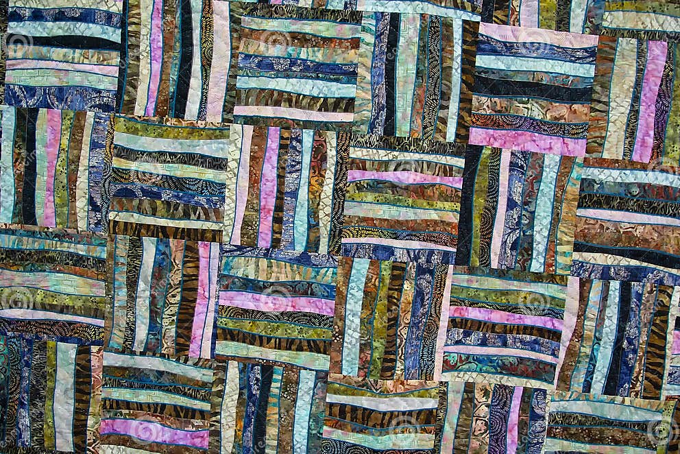 A Patchwork Quilt with Many Different Colored Squares Stock Image ...