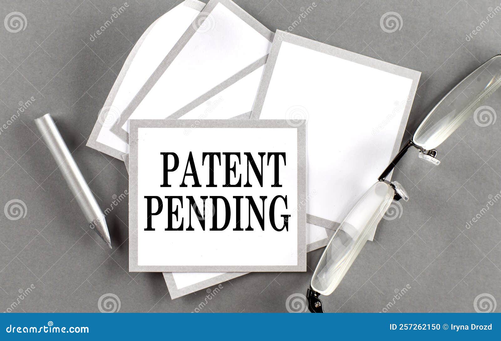 PATENT PENDING Text Written on a Sticky with Pencil and Glasses Stock ...