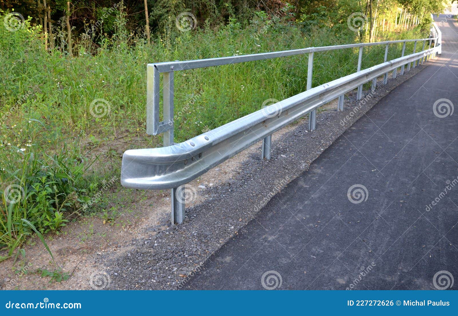 Path for Cyclists with an Asphalt Surface. Galvanized Iron Railing Over ...