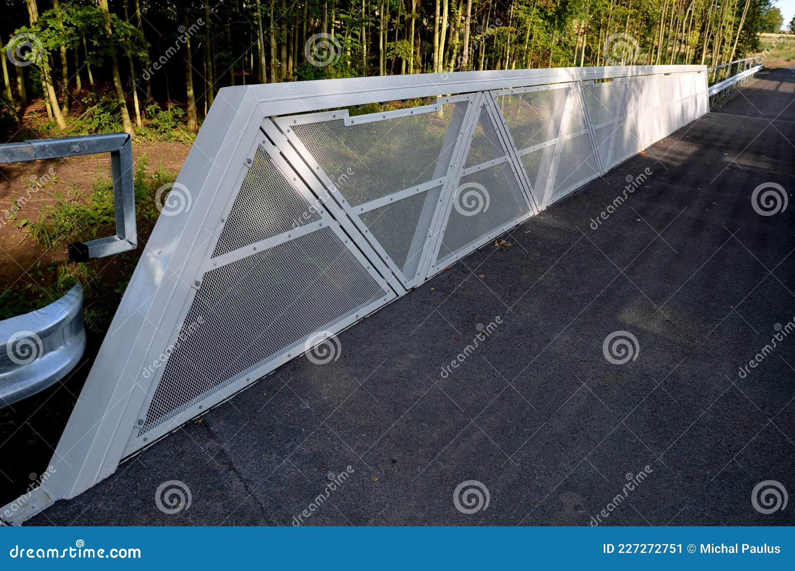 Path For Cyclists With An Asphalt Surface. Galvanized Iron Railing Over ...