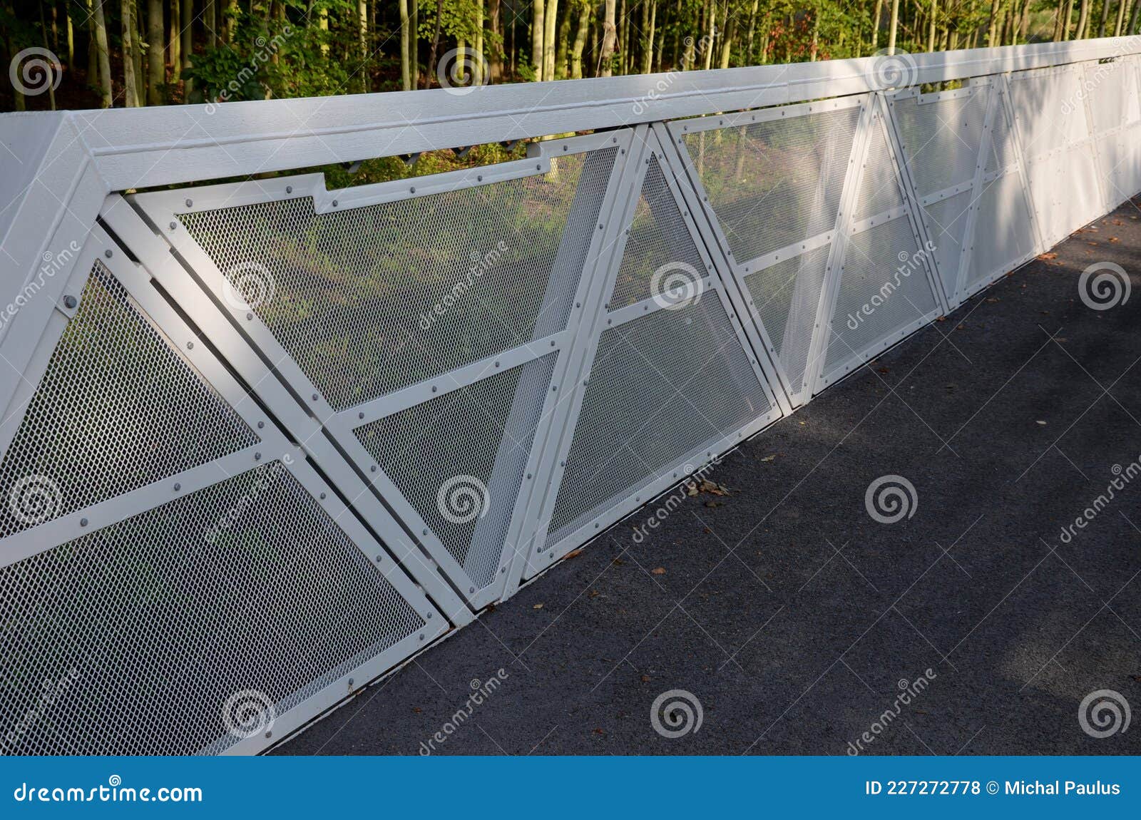 Path for Cyclists with an Asphalt Surface. Galvanized Iron Railing Over ...