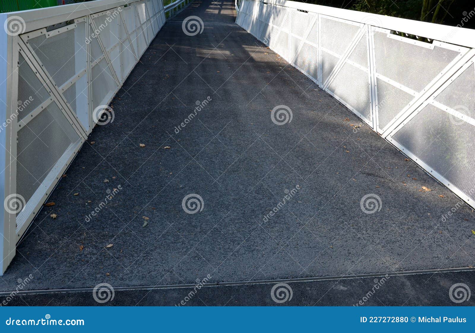 Path for Cyclists with an Asphalt Surface. Galvanized Iron Railing Over ...