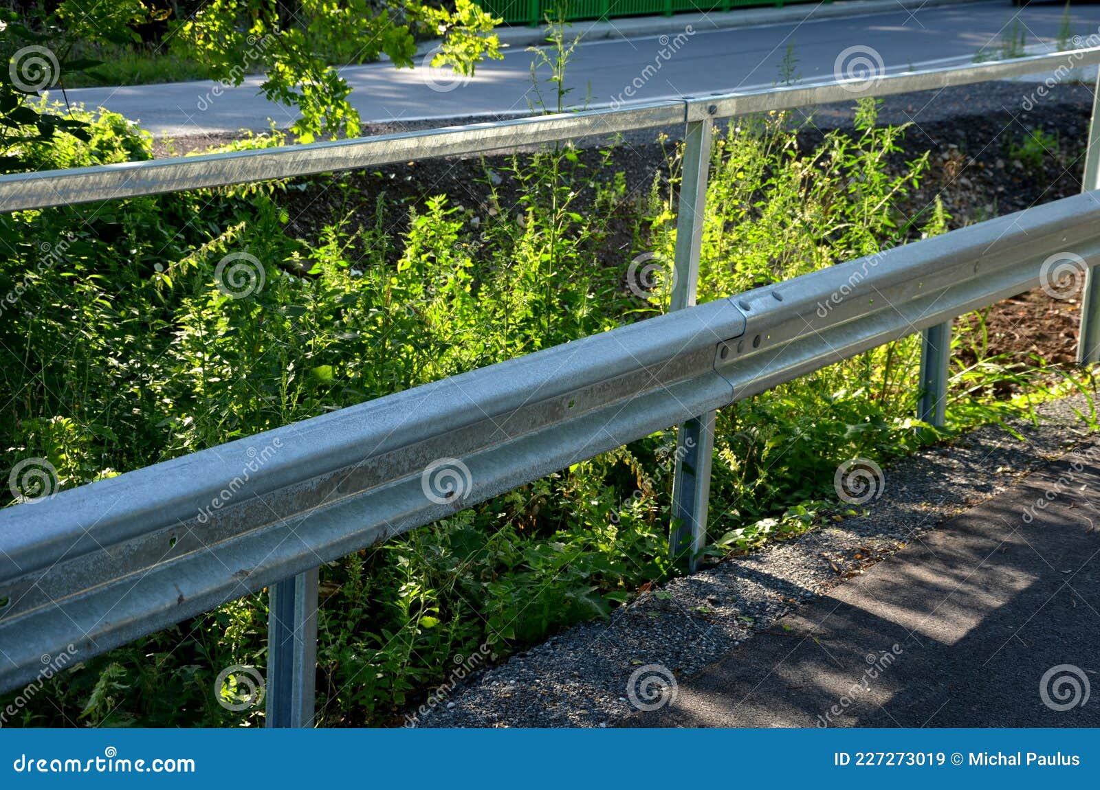 Path for Cyclists with an Asphalt Surface. Galvanized Iron Railing Over ...
