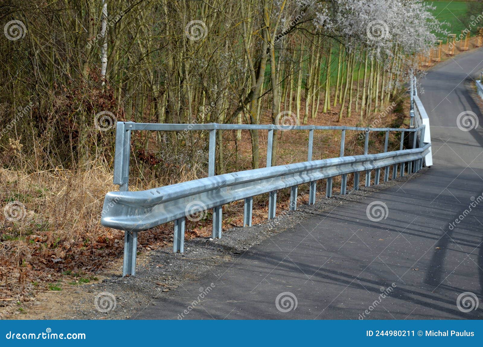 Path for Cyclists with an Asphalt Surface. Galvanized Iron Railing Over ...