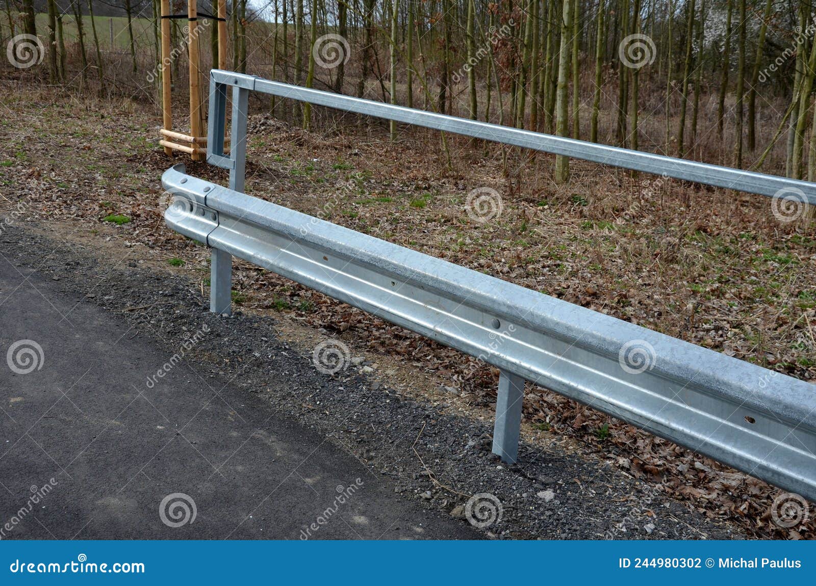 Path for Cyclists with an Asphalt Surface. Galvanized Iron Railing Over ...