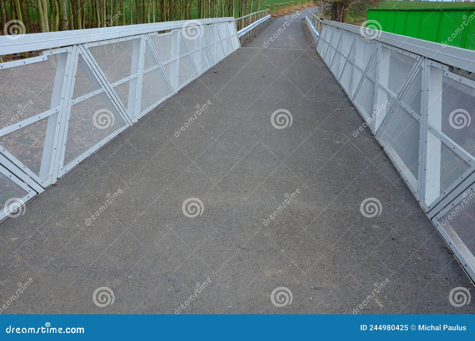 Path for Cyclists with an Asphalt Surface. Galvanized Iron Railing Over ...