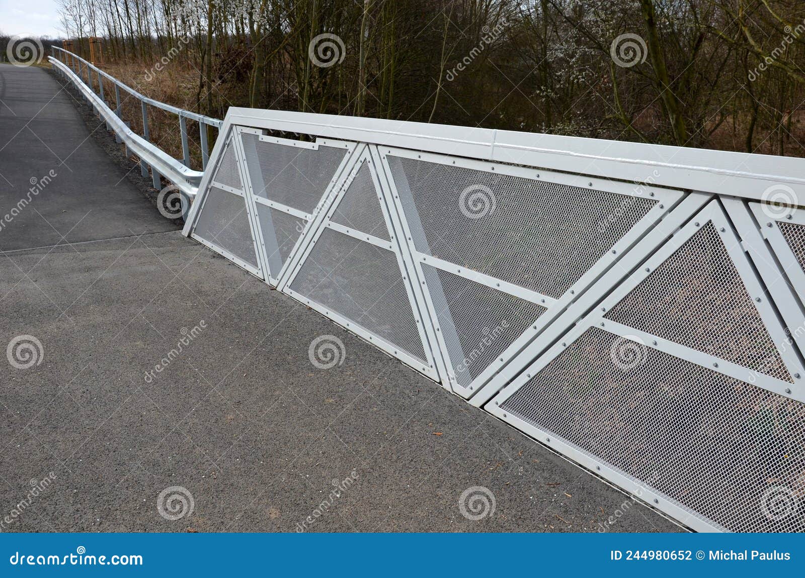 Path for Cyclists with an Asphalt Surface. Galvanized Iron Railing Over ...