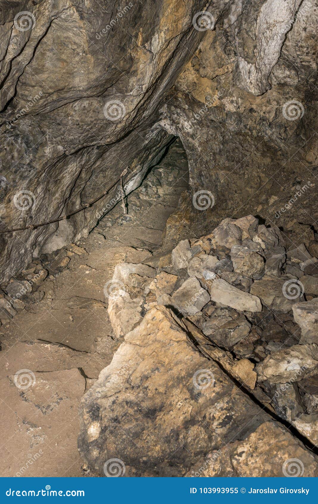 Descending into the cave stock image. Image of path - 103993955