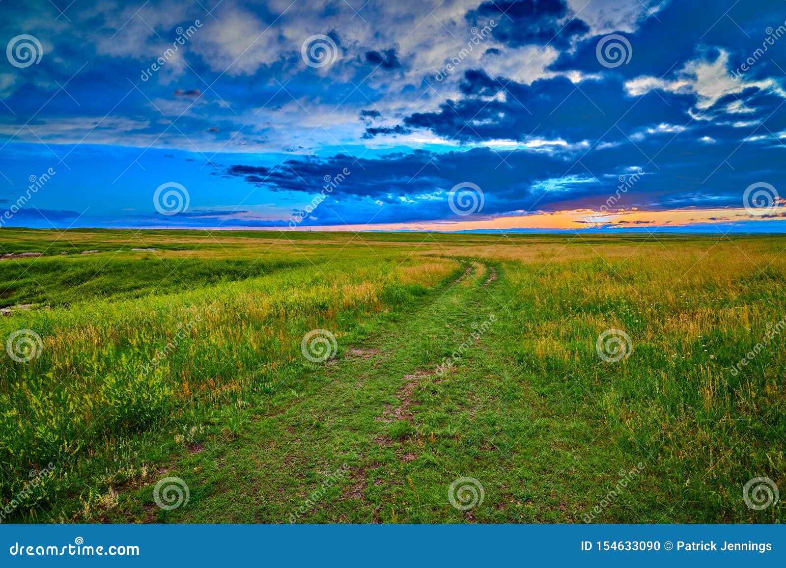 Path in a Field with Sunset on Horizon Stock Photo - Image of panoramic ...