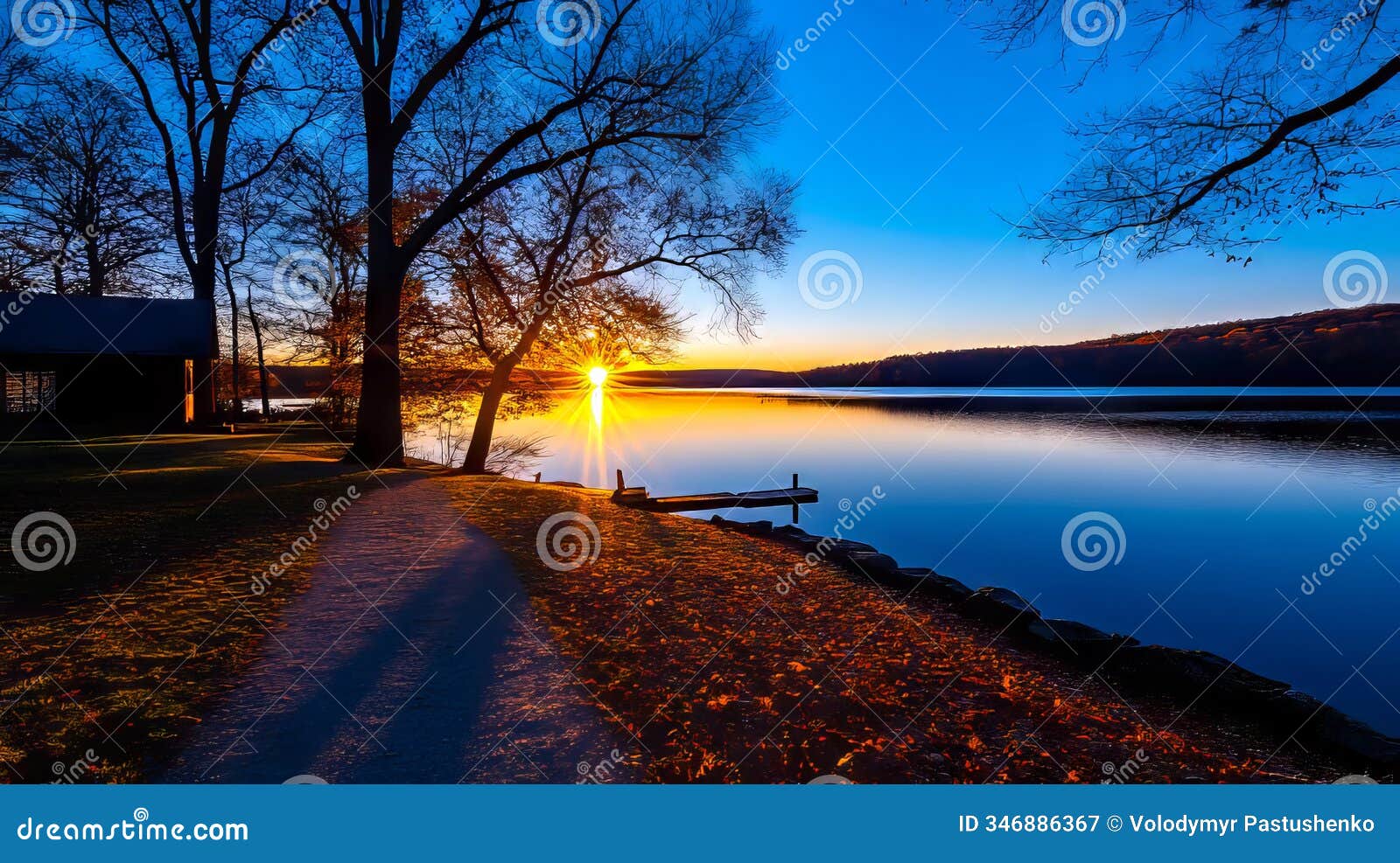 A Path Leading To a Lake with a Dock in the Middle of it Stock Image ...