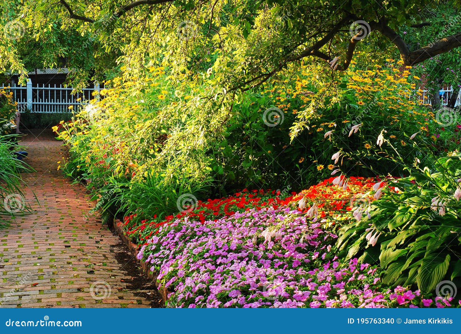 A Path Leads through a Lovely Colorful Garden Stock Photo - Image of ...