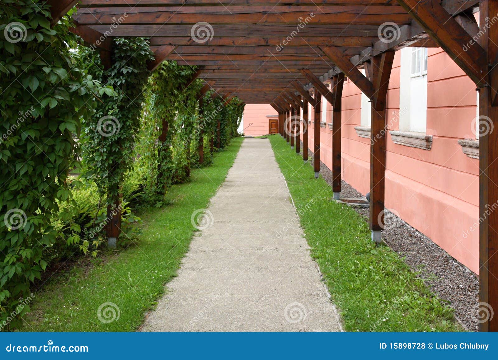 Path lined with frame-work stock photo. Image of wood - 15898728