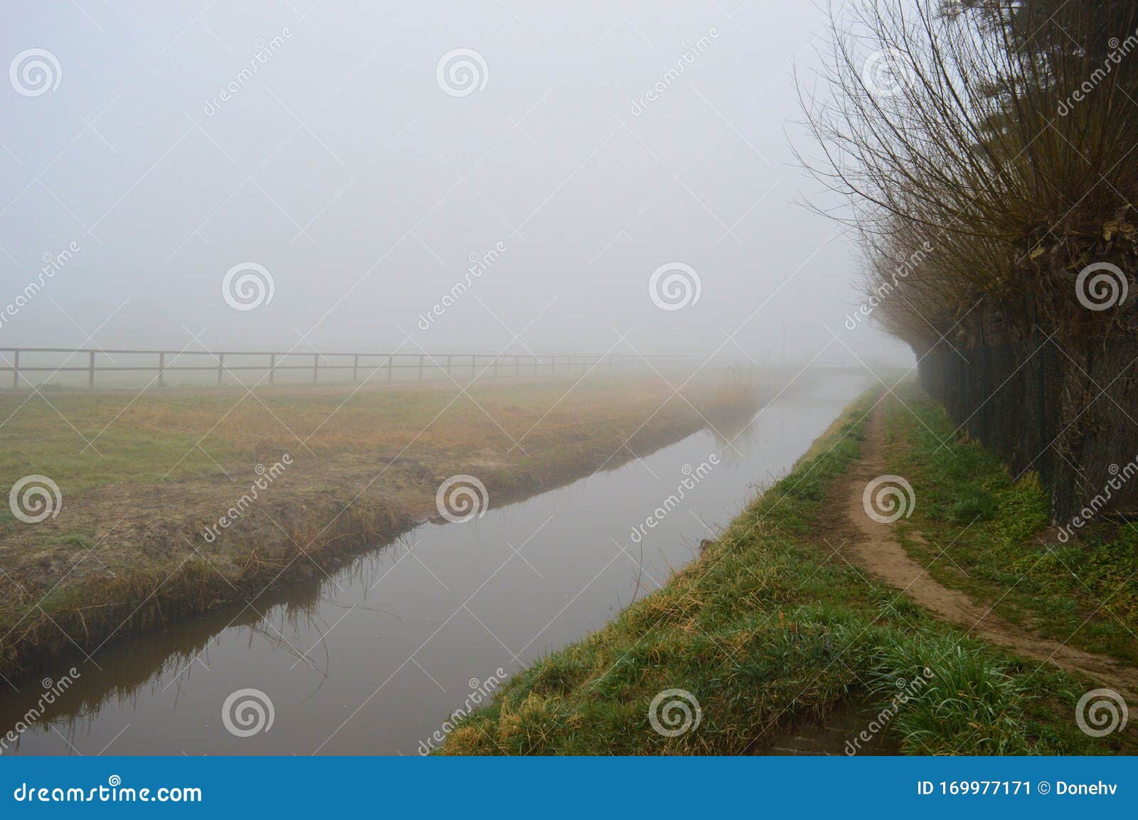Path in the Mist Next To a River Stock Image - Image of outdoor, nature ...