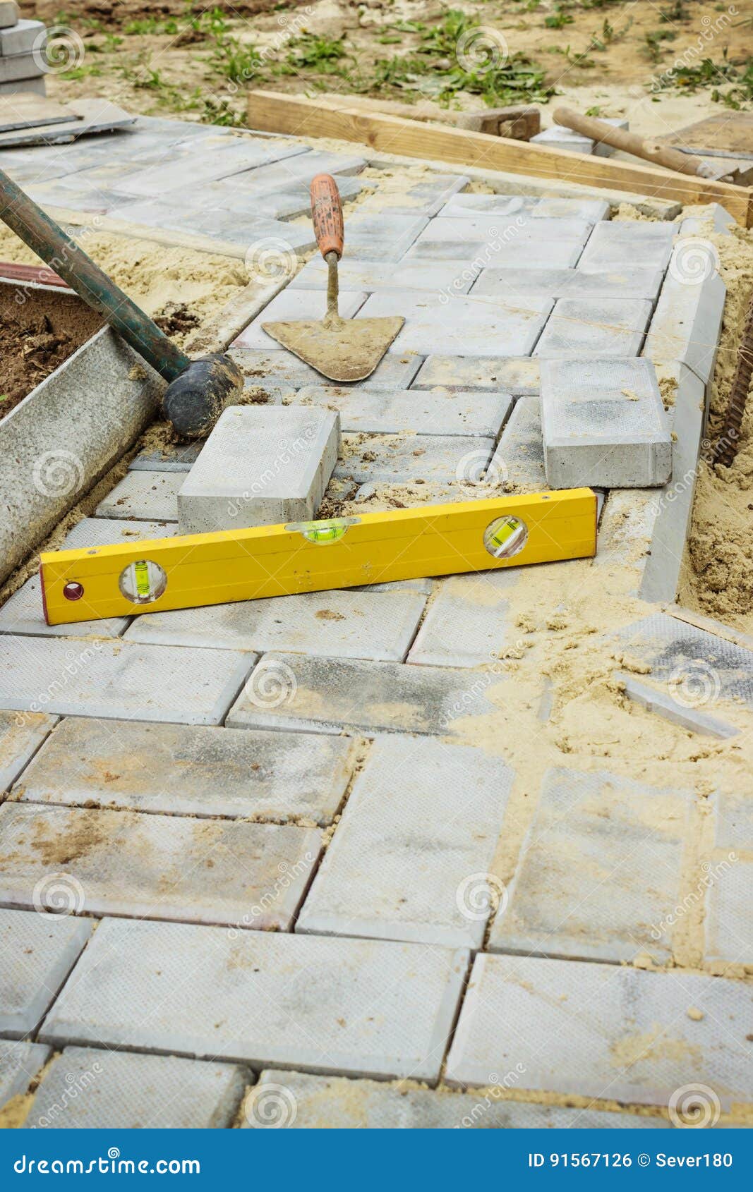 Process Of Construction Of Brick Paved Sidewalk, Half Built Pavement ...