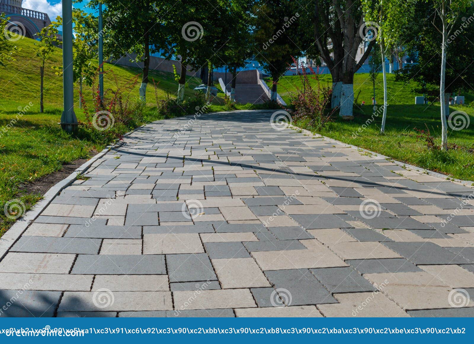 A Path in the Park Paved with Tiles Stock Image - Image of green, lane ...