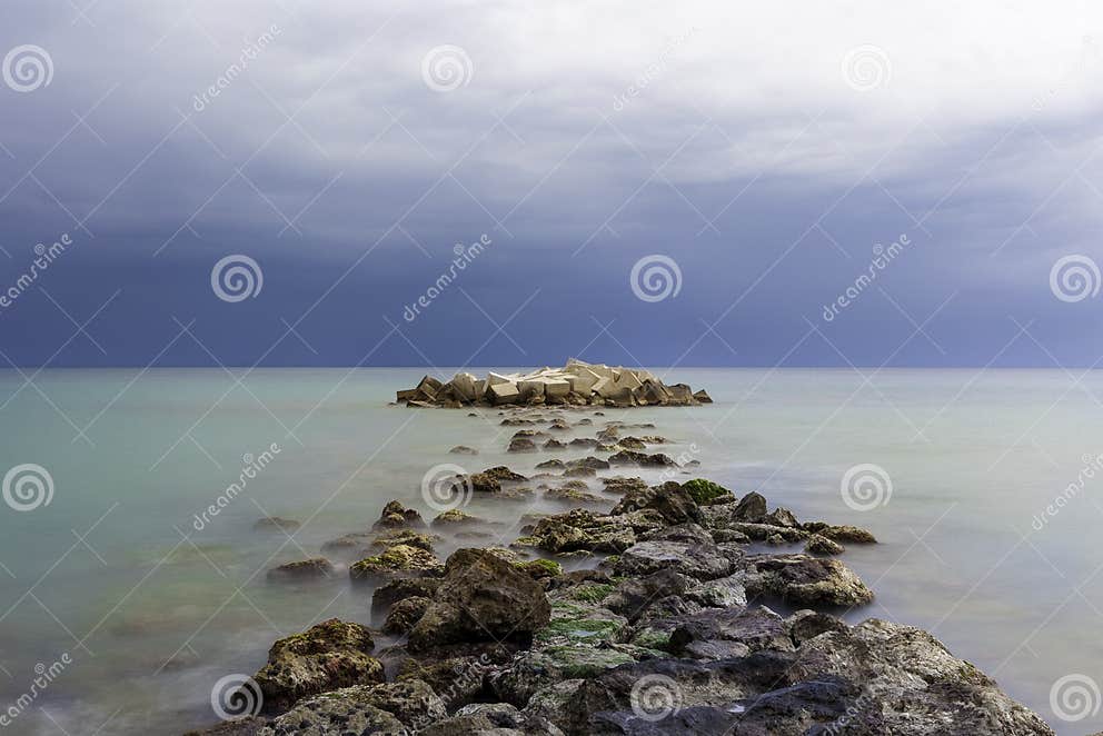 Path of rocks on water stock image. Image of natural - 41601423