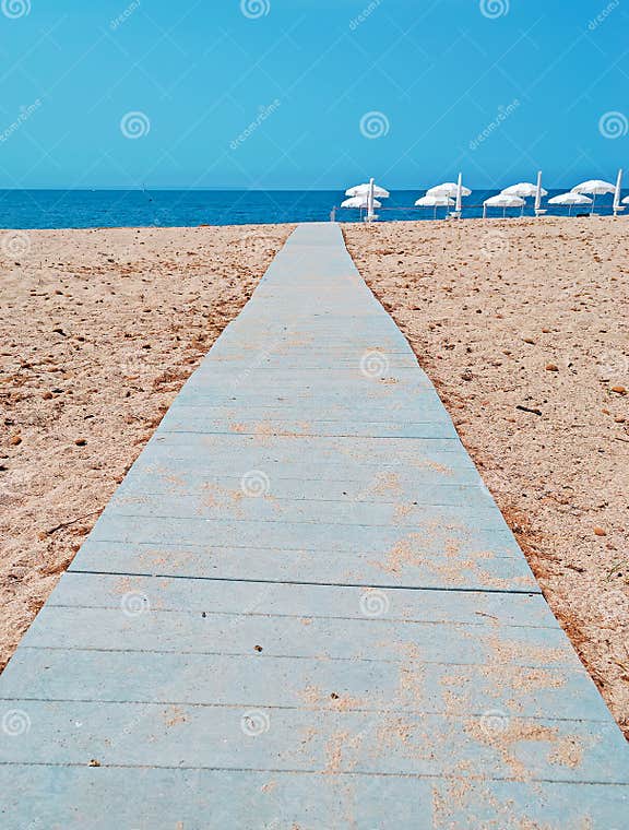 Path on the sand stock image. Image of umbrella, coast - 32005231
