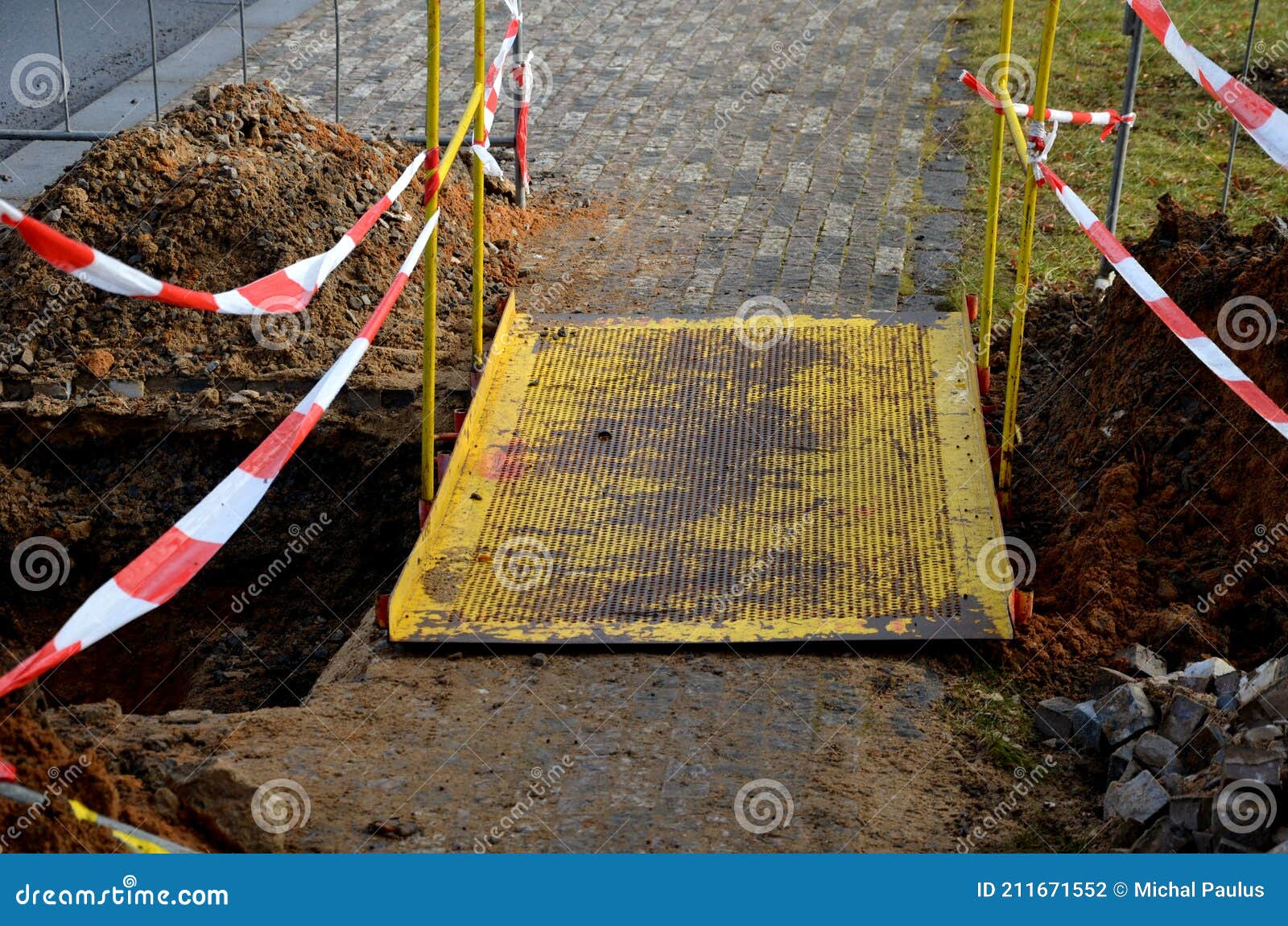 The Path of the Sidewalk is Interrupted by Excavation of a Gutter for ...