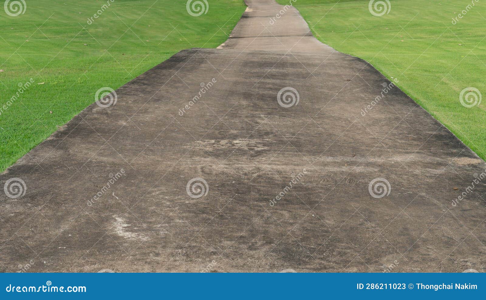 Path that Slopes in Front of a Concrete Road. Stock Image - Image of ...