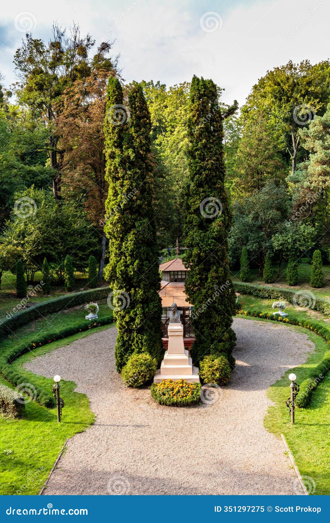 A Path with a Stone Walkway and a Small Stone Structure in the Middle ...