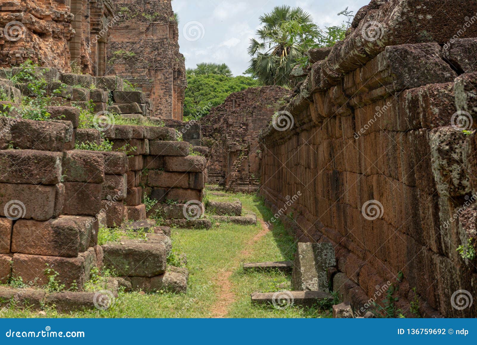 Path between Stone Wall and Temple Facade Stock Photo - Image of angkor ...