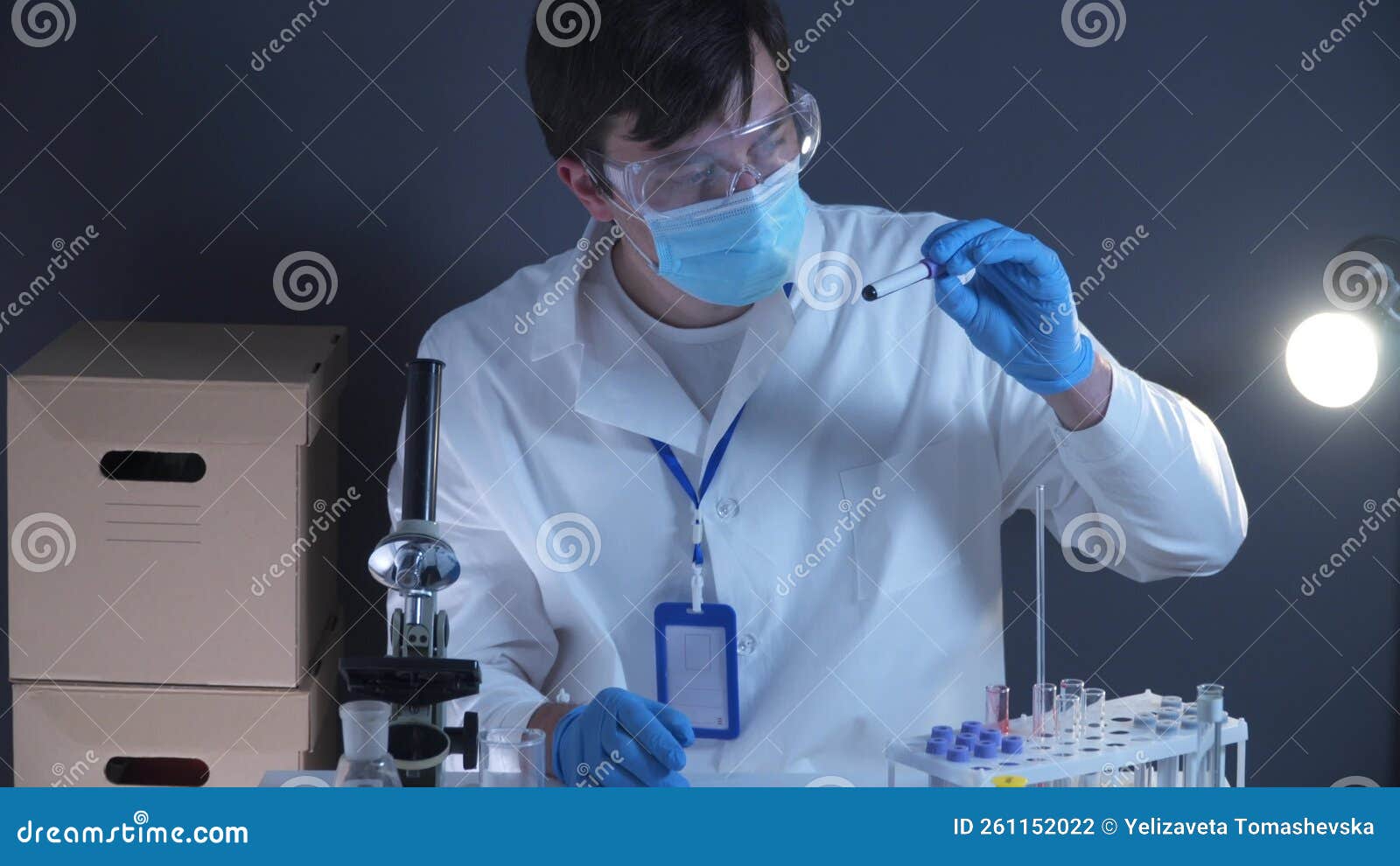 Pathologist Working in Lab with Blood Samples. Scientist Processing DNA ...