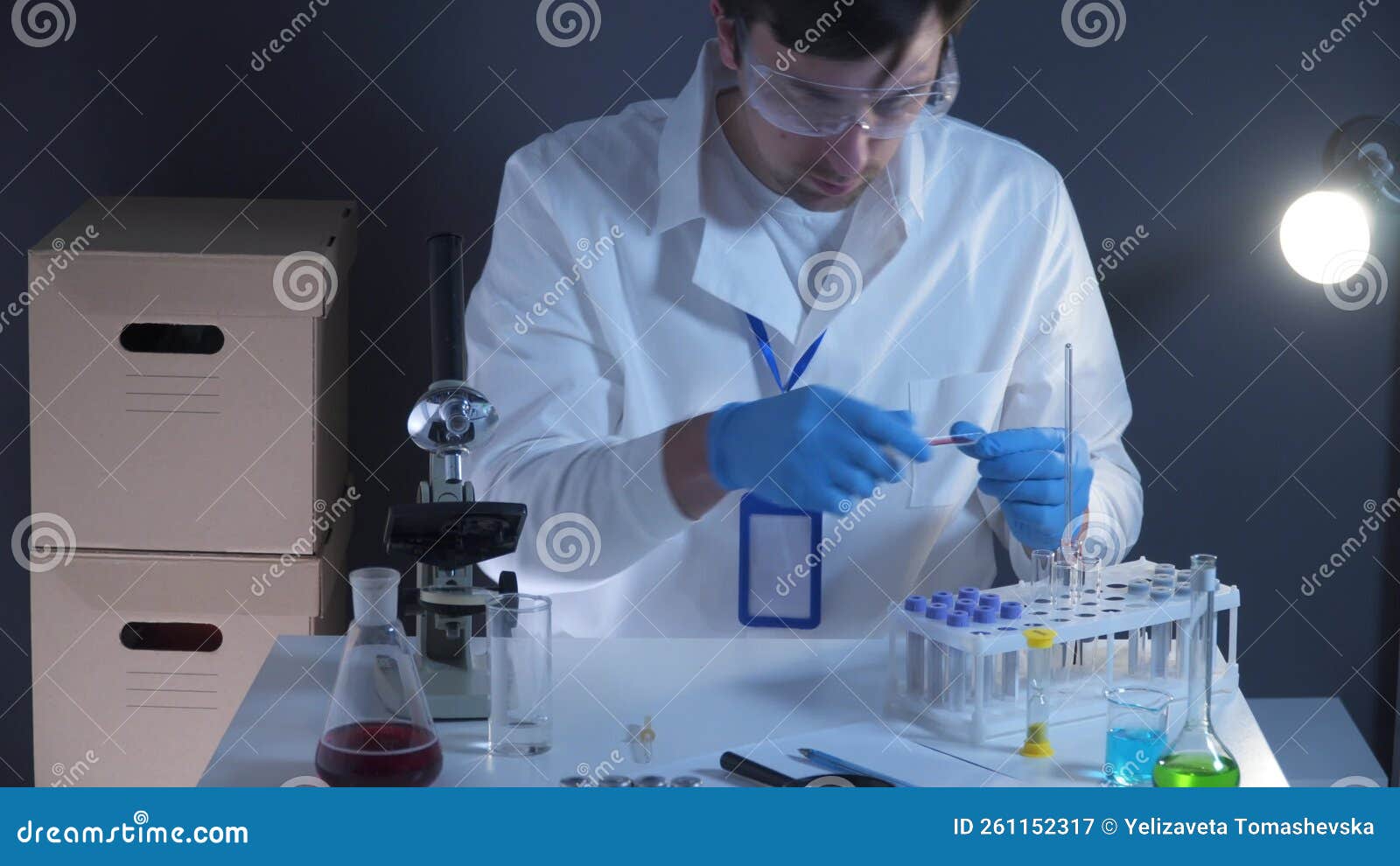 Pathologist Working in Lab with Blood Samples. Scientist Processing DNA ...