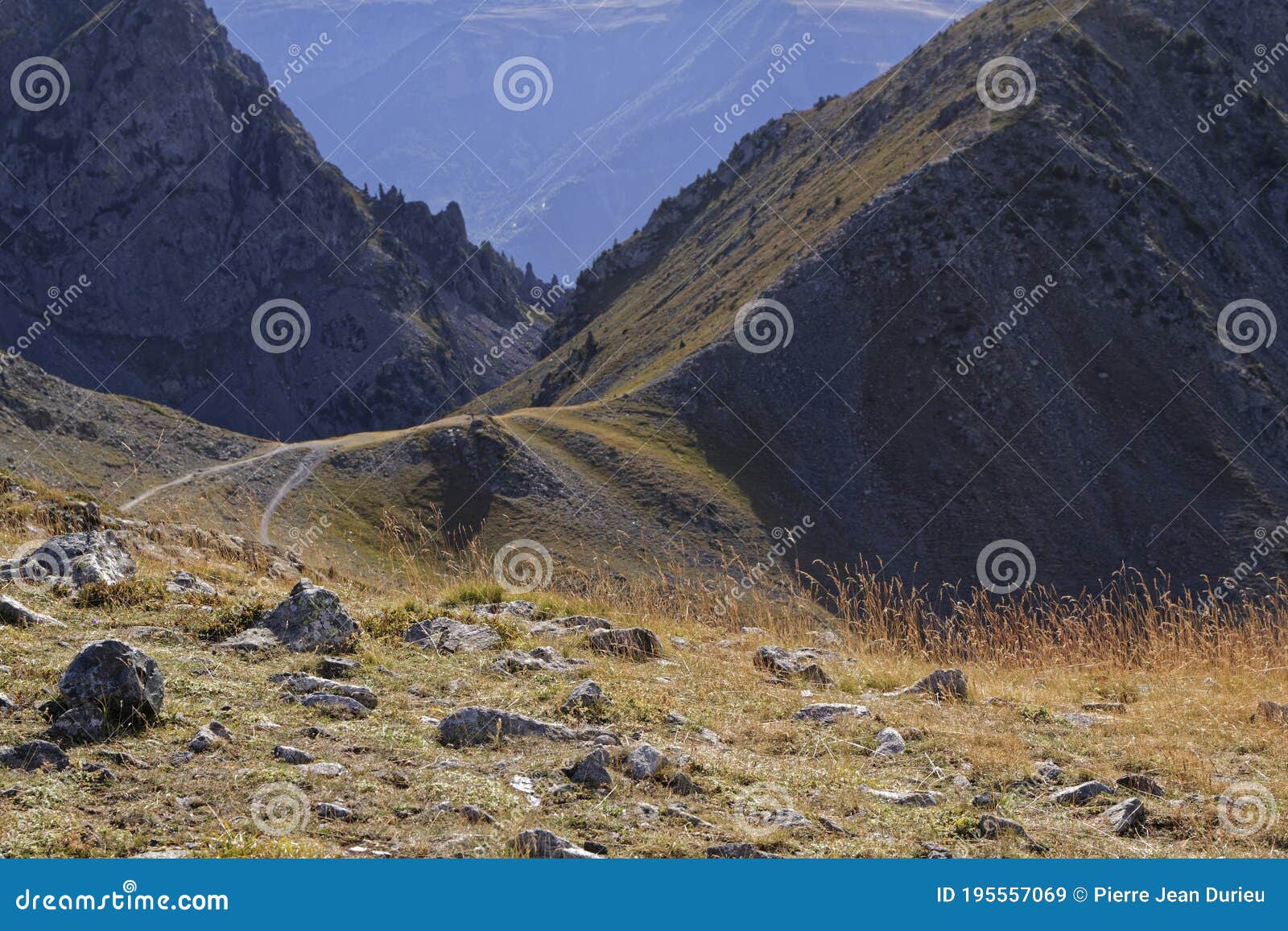 Paths on a mountain pass stock image. Image of path - 195557069