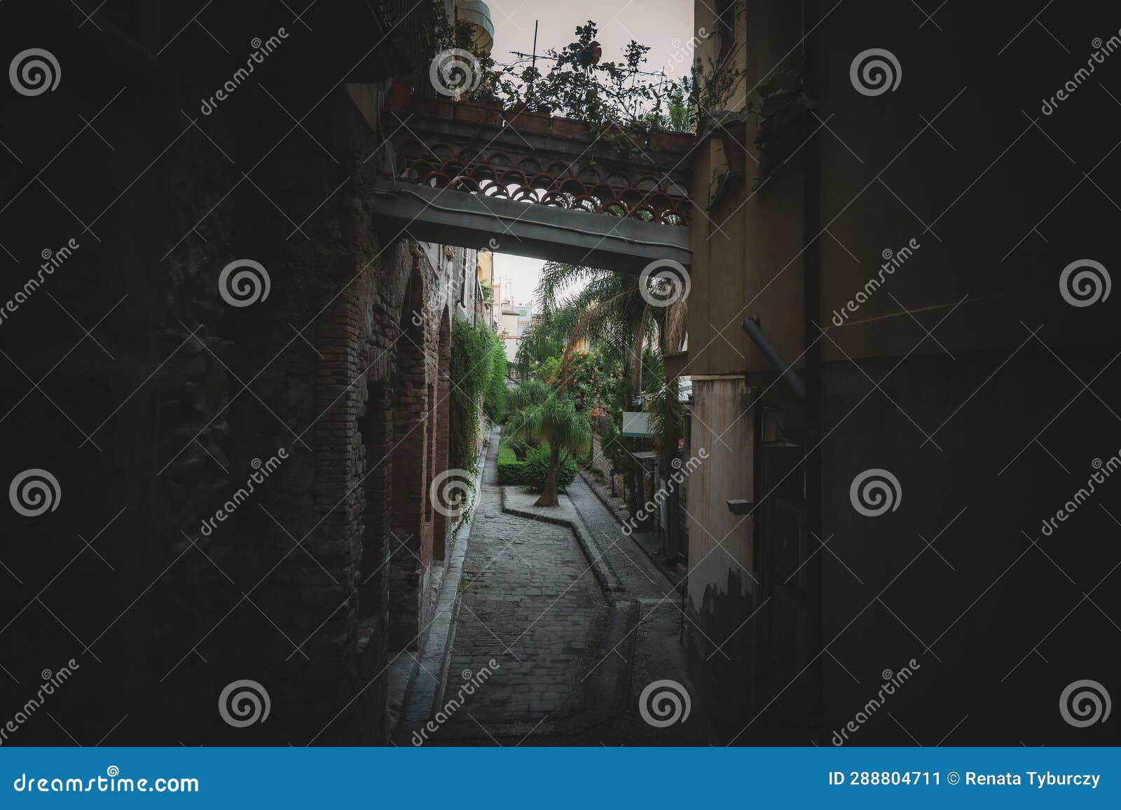 Pathway, Dark Alley with Brick Wall and Stucco. Elevated Structure with ...