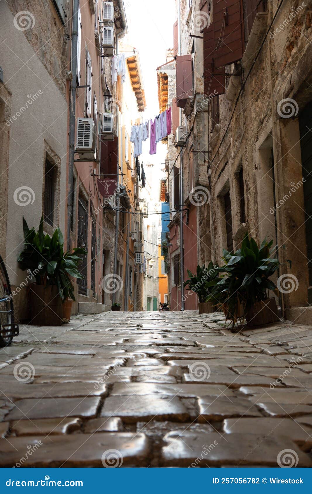 Pathway in the Middle of the Houses with Clothes Hanging Stock Photo ...