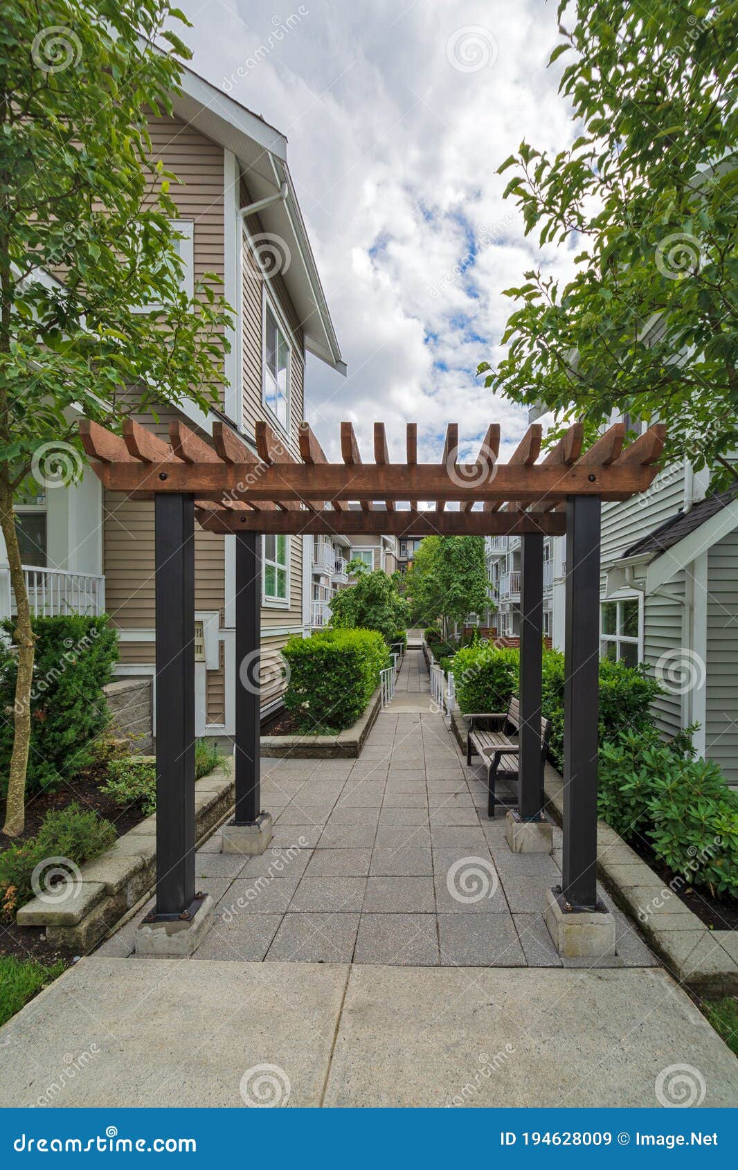 Pathway in Residential Area between Two Rows of Townhouses. Stock Image ...