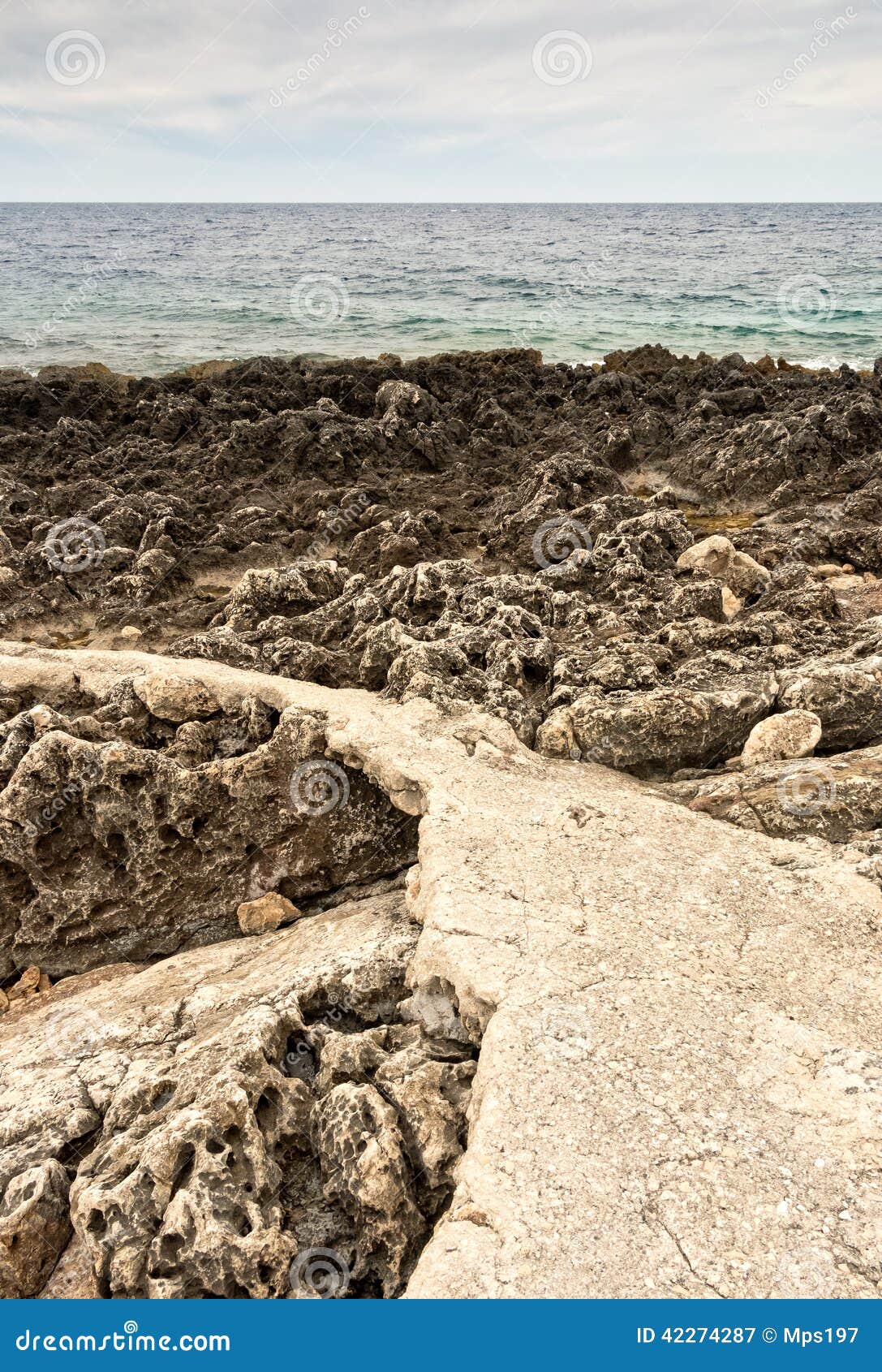 Pathway at a rocky shore stock image. Image of outdoor - 42274287