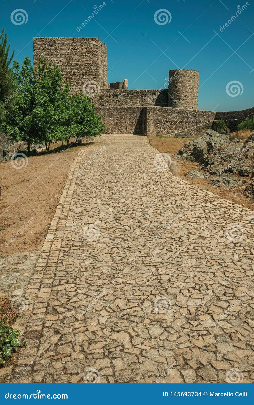 Pathway with Trees Going To Wall and Tower at the Marvao Castle Stock ...