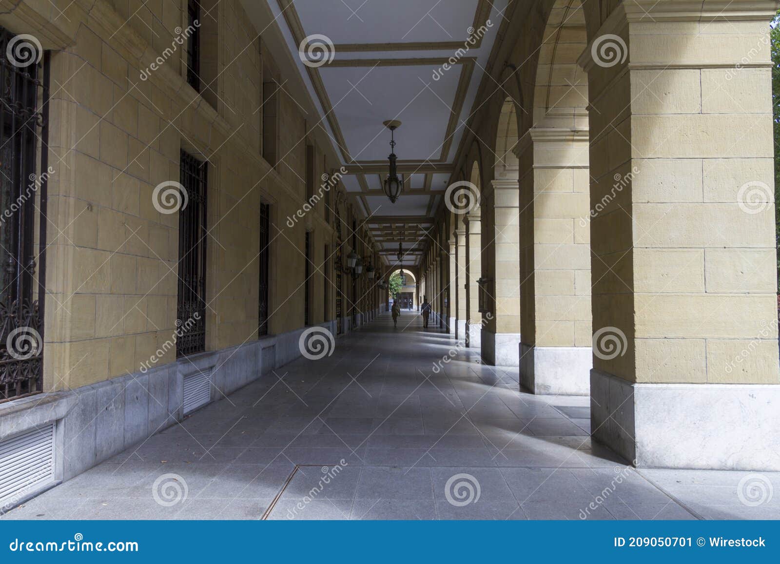 Pathway Under the Building with Giant Arches with Pillars Stock Image ...