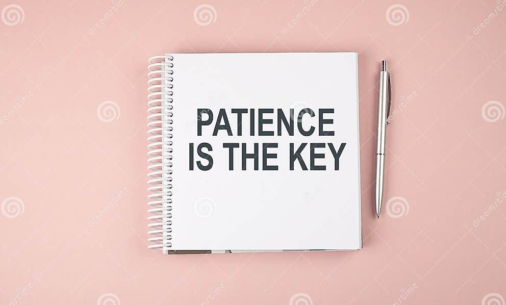 PATIENCE is the KEY Text on Notebook with Pen on the Pink Background ...