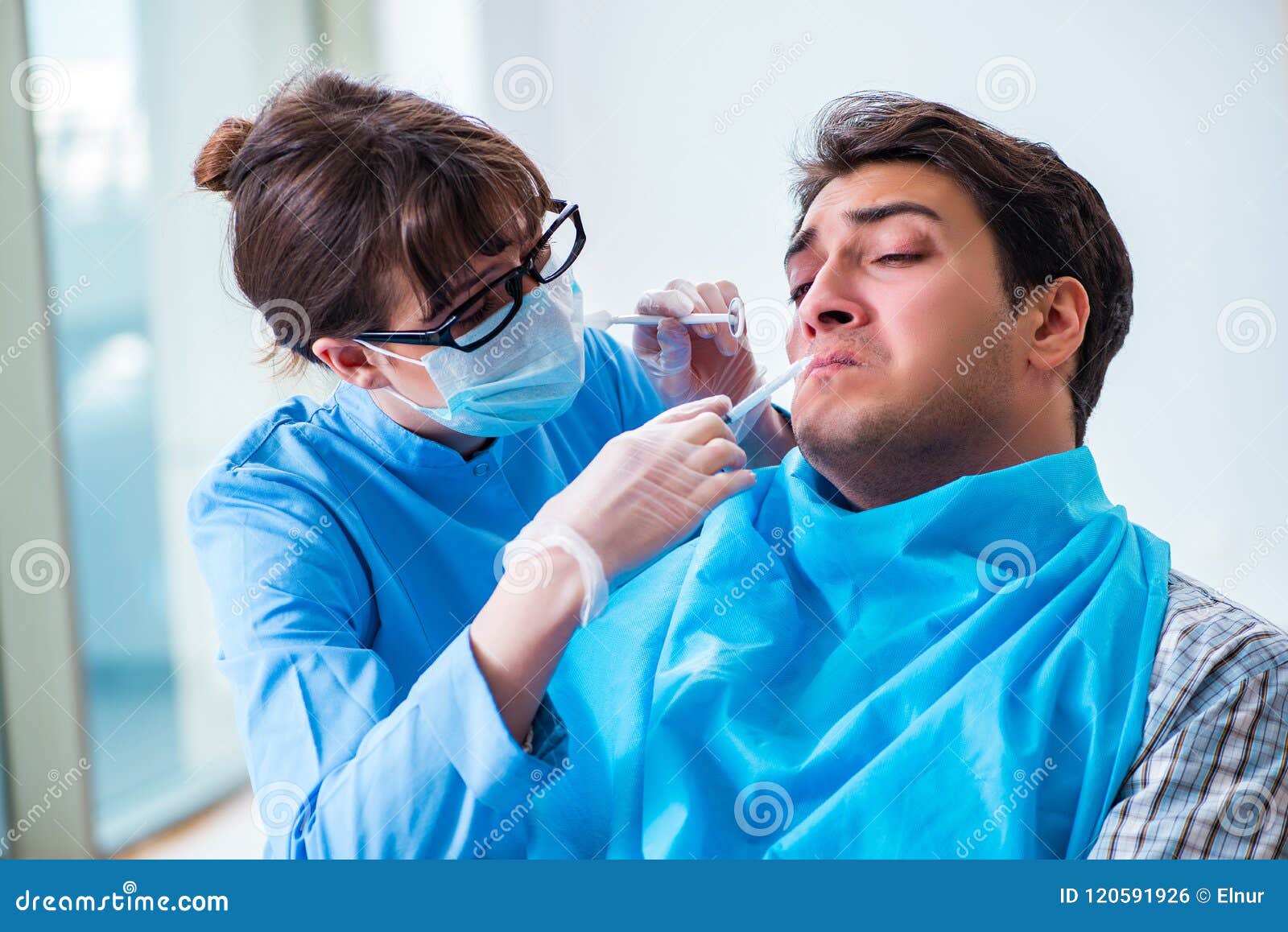 The Patient Afraid of Dentist during Doctor Visit Stock Photo - Image ...
