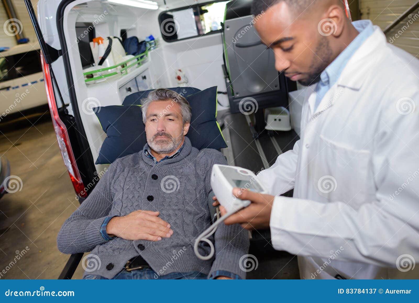 Patient Being Treated by Paramedic Stock Image - Image of accident ...