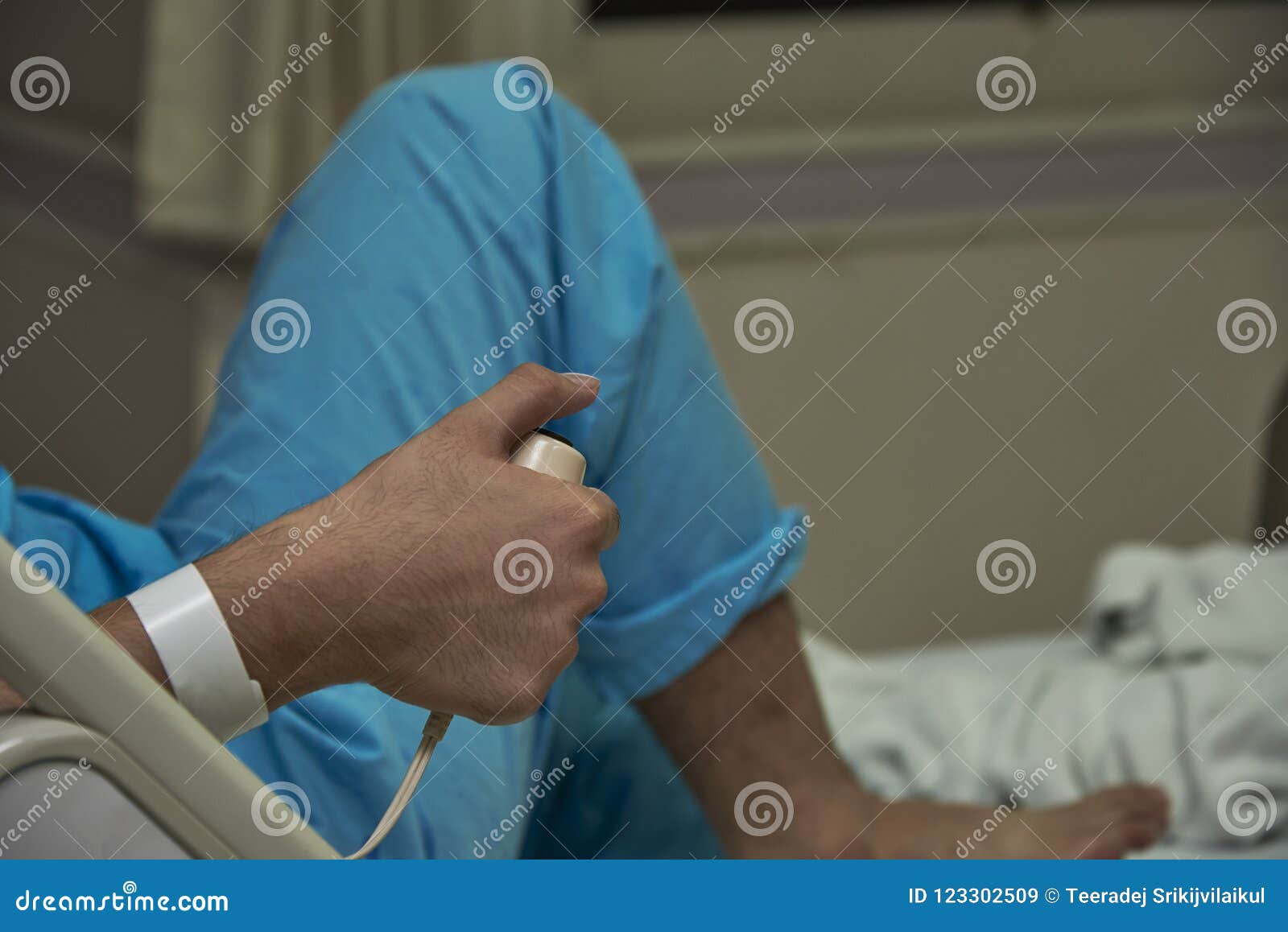 A Patient Pressing a Button Calling for Nurse Stock Image - Image of ...