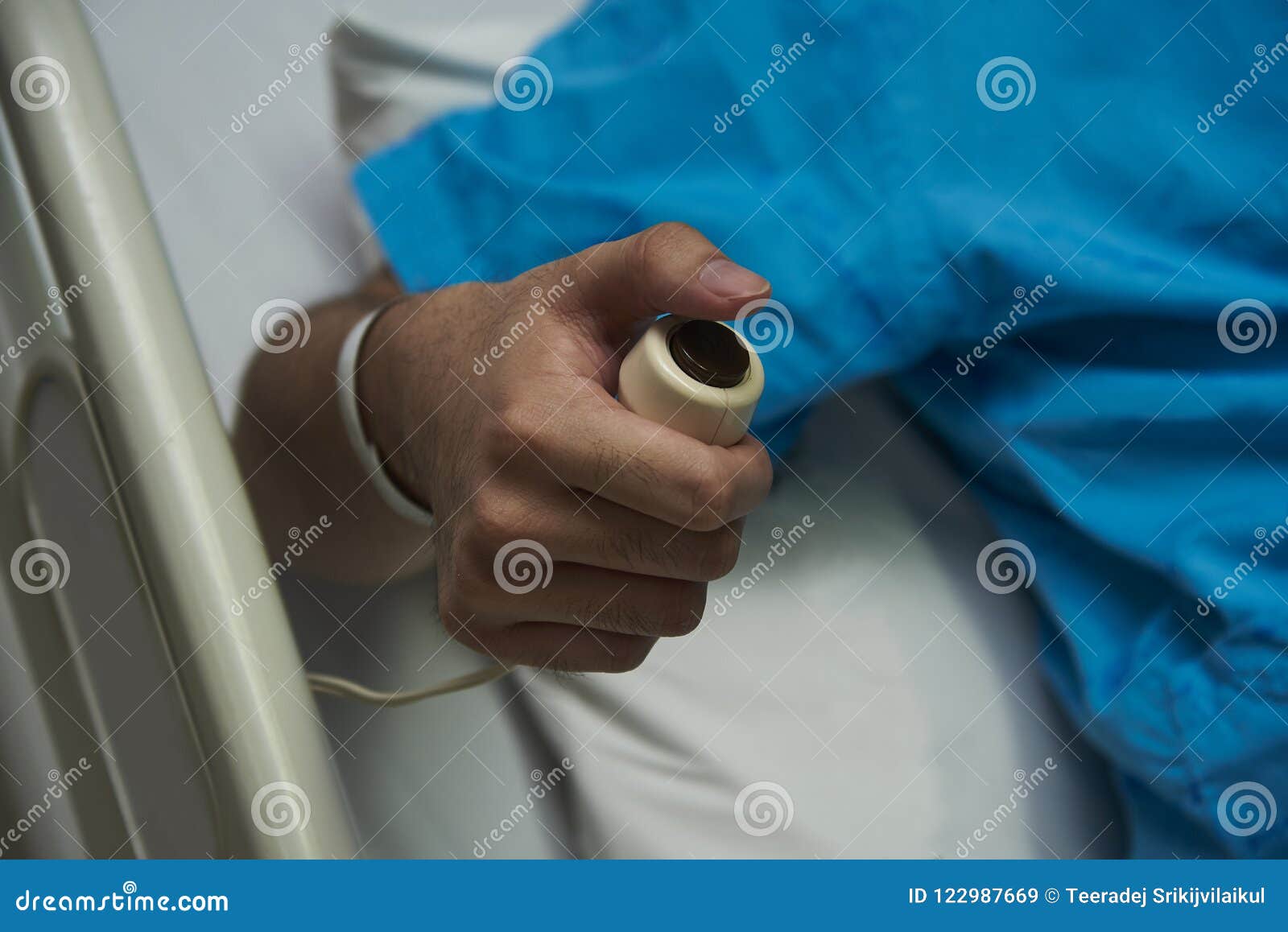 A Patient Pressing a Button Calling for Nurse Stock Image - Image of ...