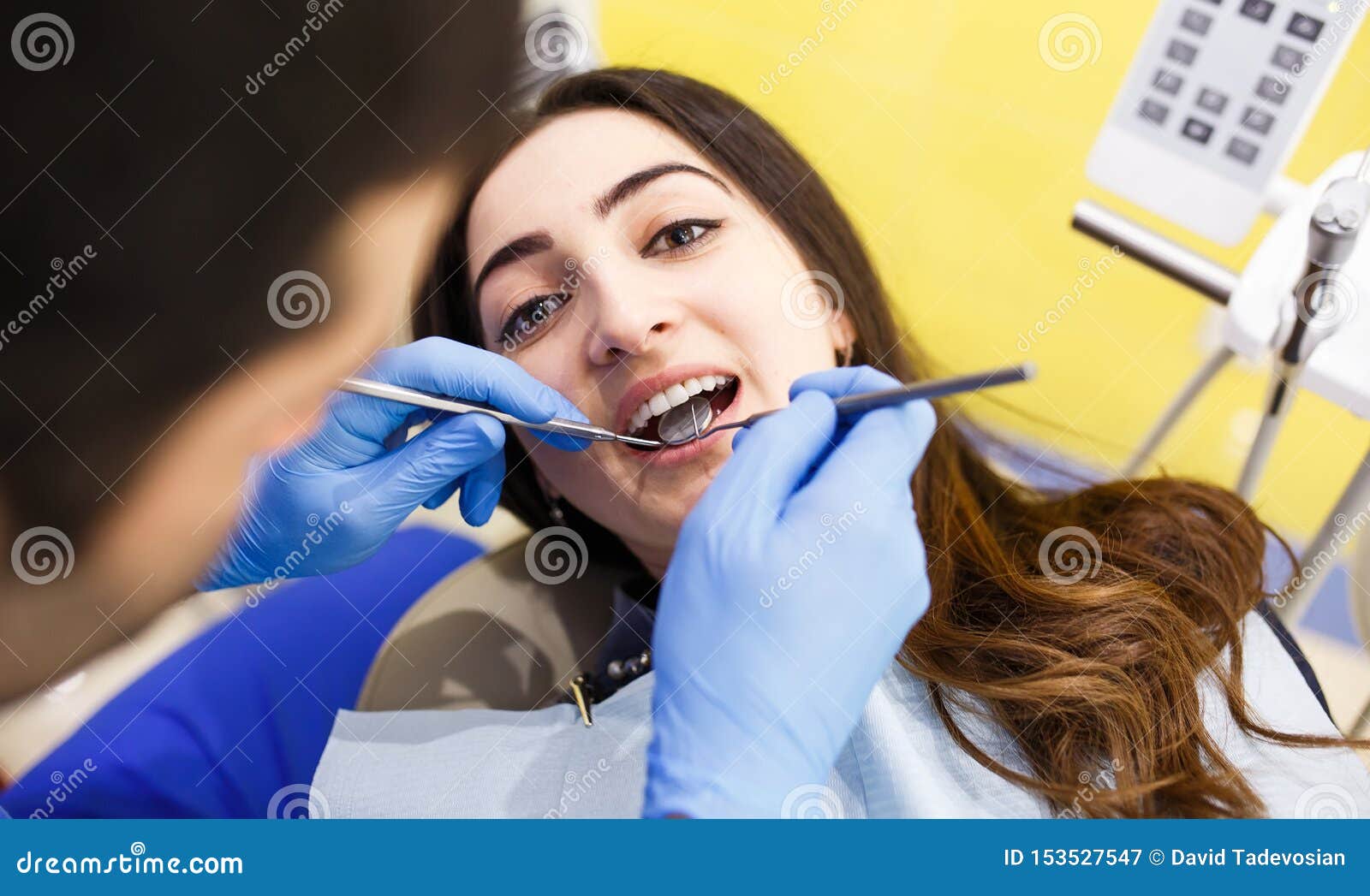 The Patient Caring for Teeth in the Dental Clinic Stock Image - Image ...