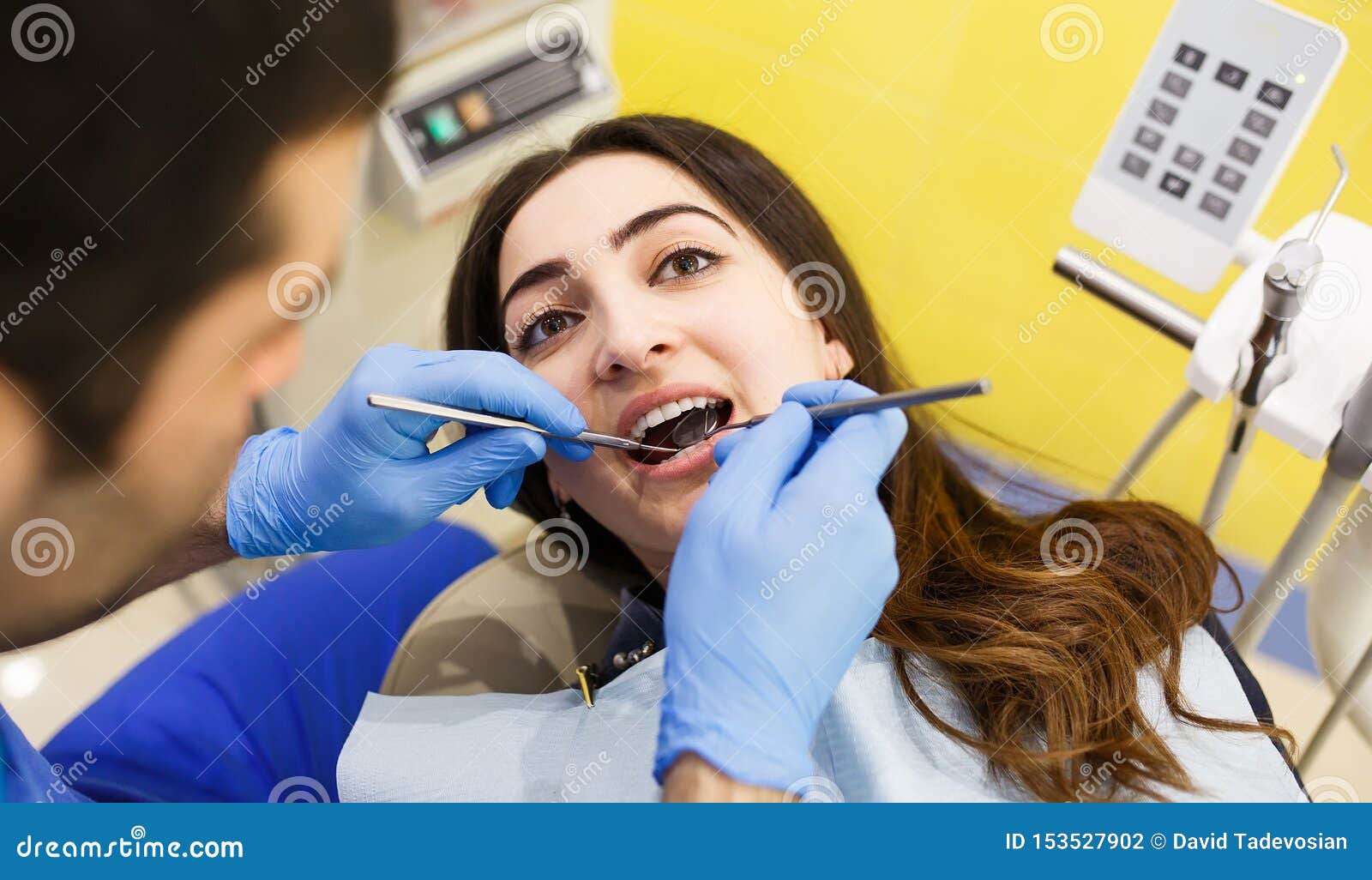 The Patient Caring for Teeth in the Dental Clinic Stock Photo - Image ...