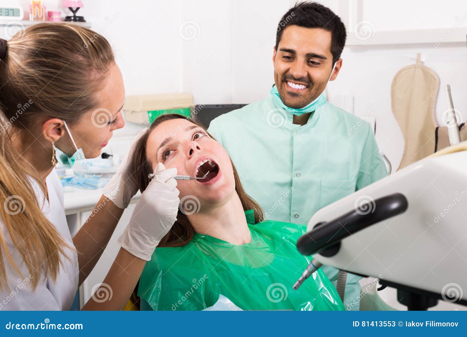 Patient Checking Out Her Teeth at Dentist Stock Image - Image of ...
